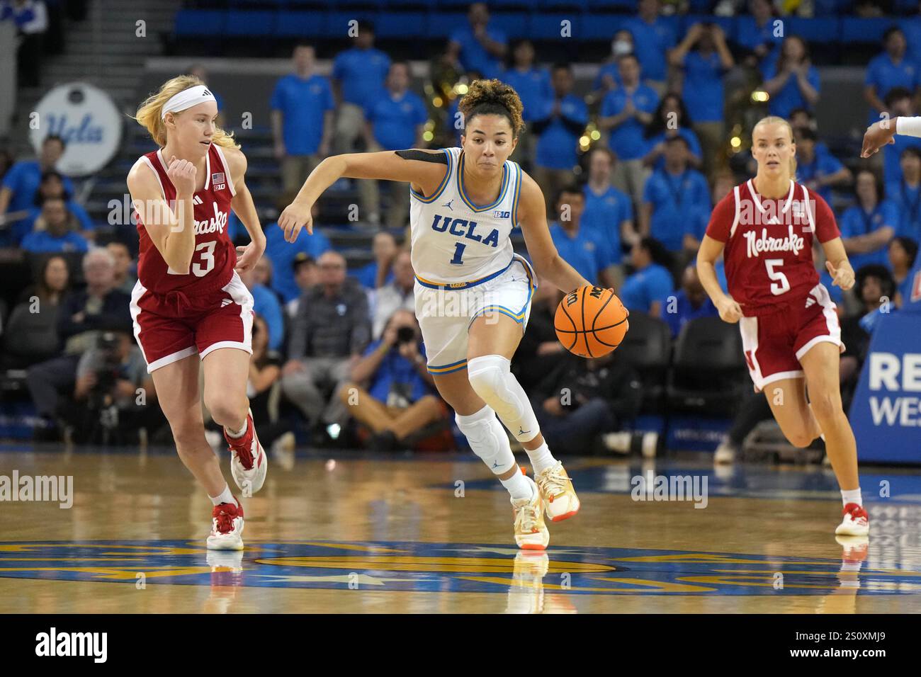 UCLA Bruins guard Kiki Rice (1) dribbles the ball against Nebraska ...