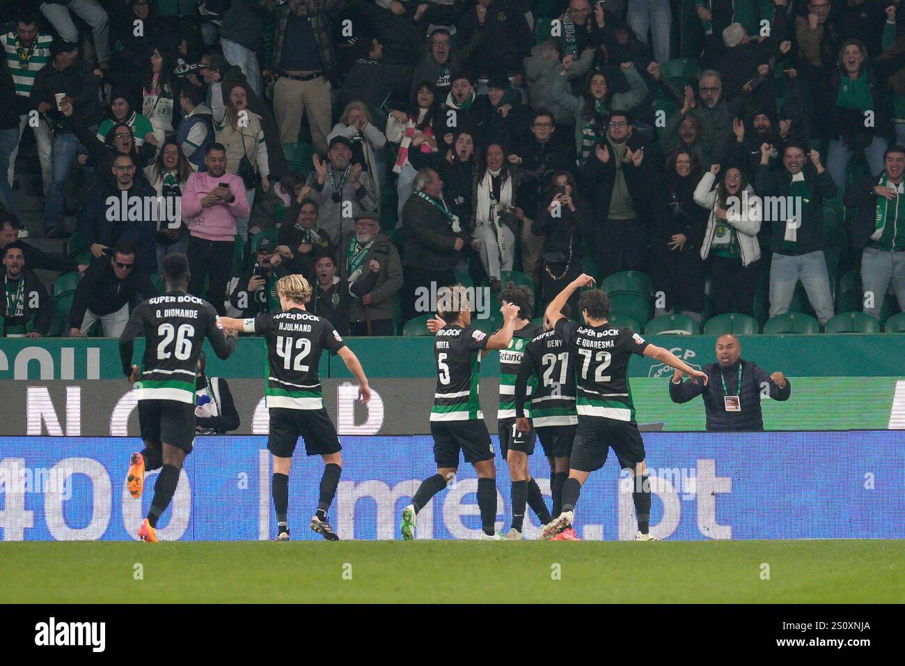 Lisbon, Portugal. 29th Dec, 2024. Sporting CP players celebrate a goal ...