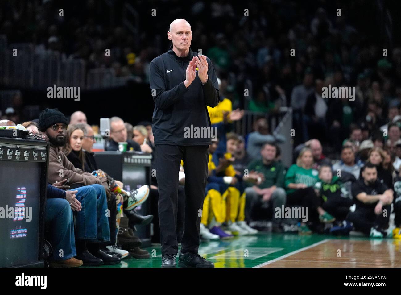 Indiana Pacers head coach Rick Carlisle applauds from the bench in the ...