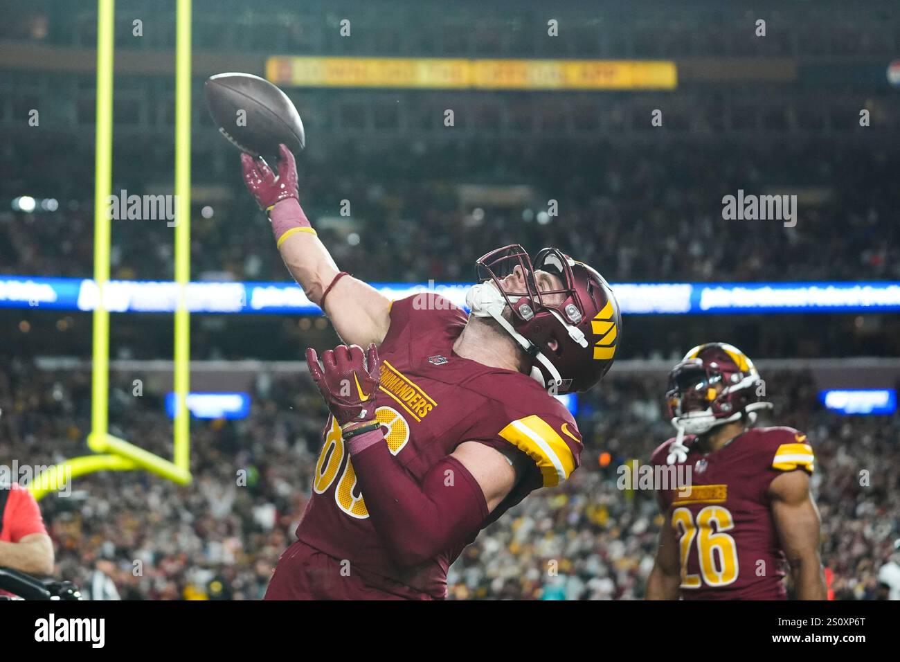 Washington Commanders tight end Zach Ertz (86) celebrates his touchdown ...