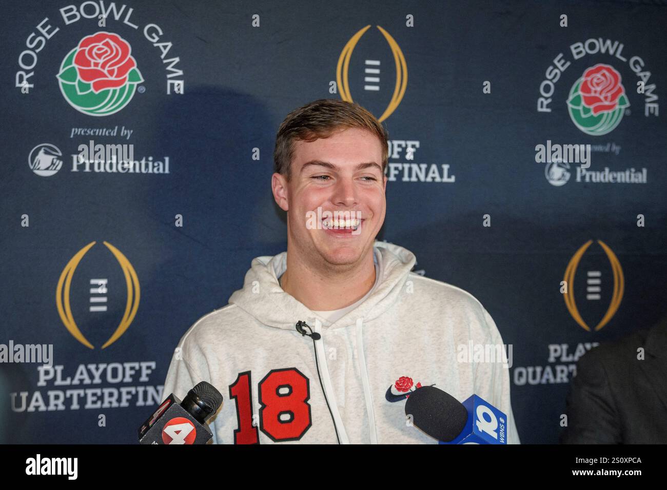 Ohio State quarterback Will Howard smiles as he talks to media on ...