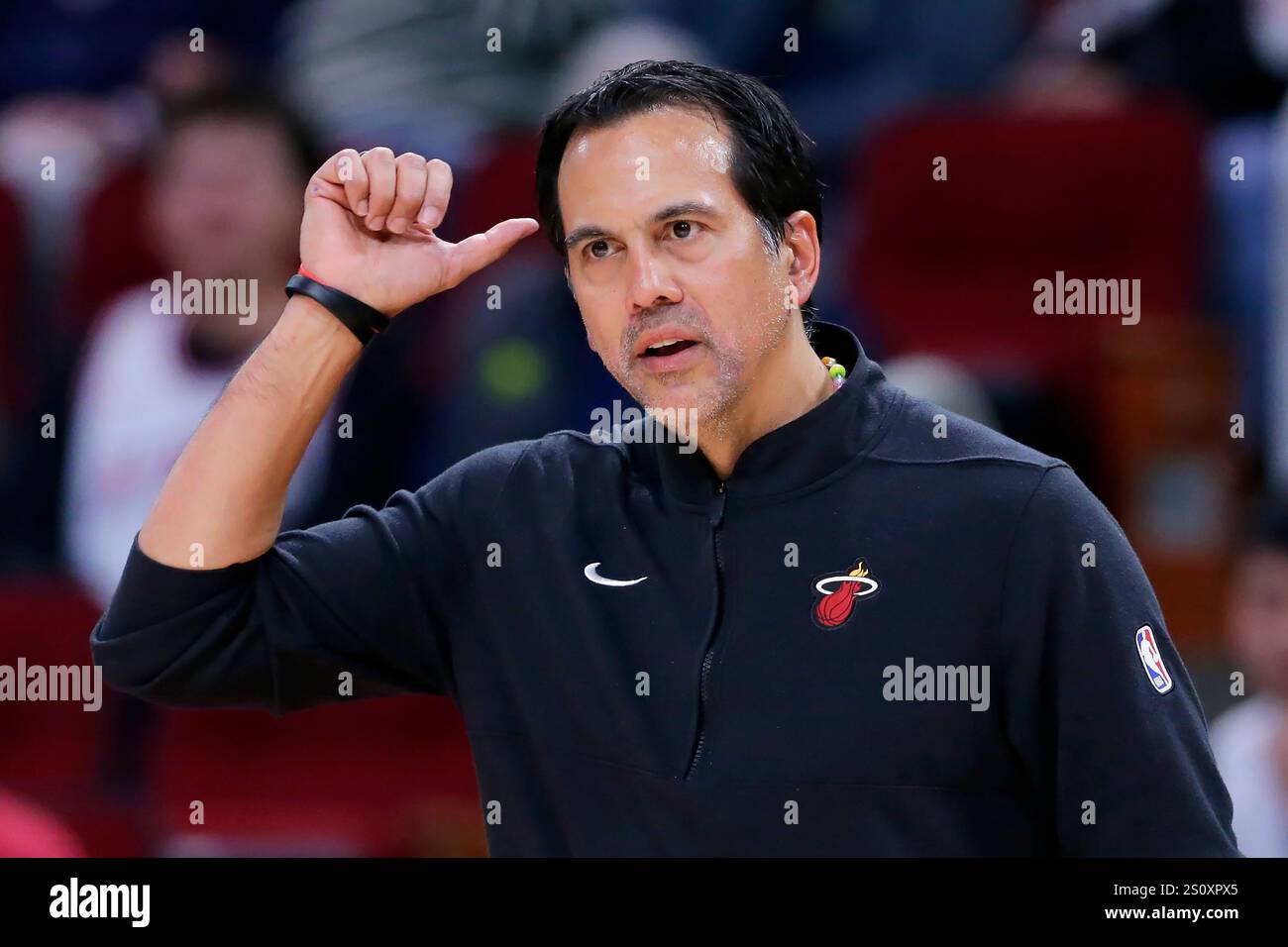 Miami Heat head coach Erik Spoelstra signals from the bench during the ...