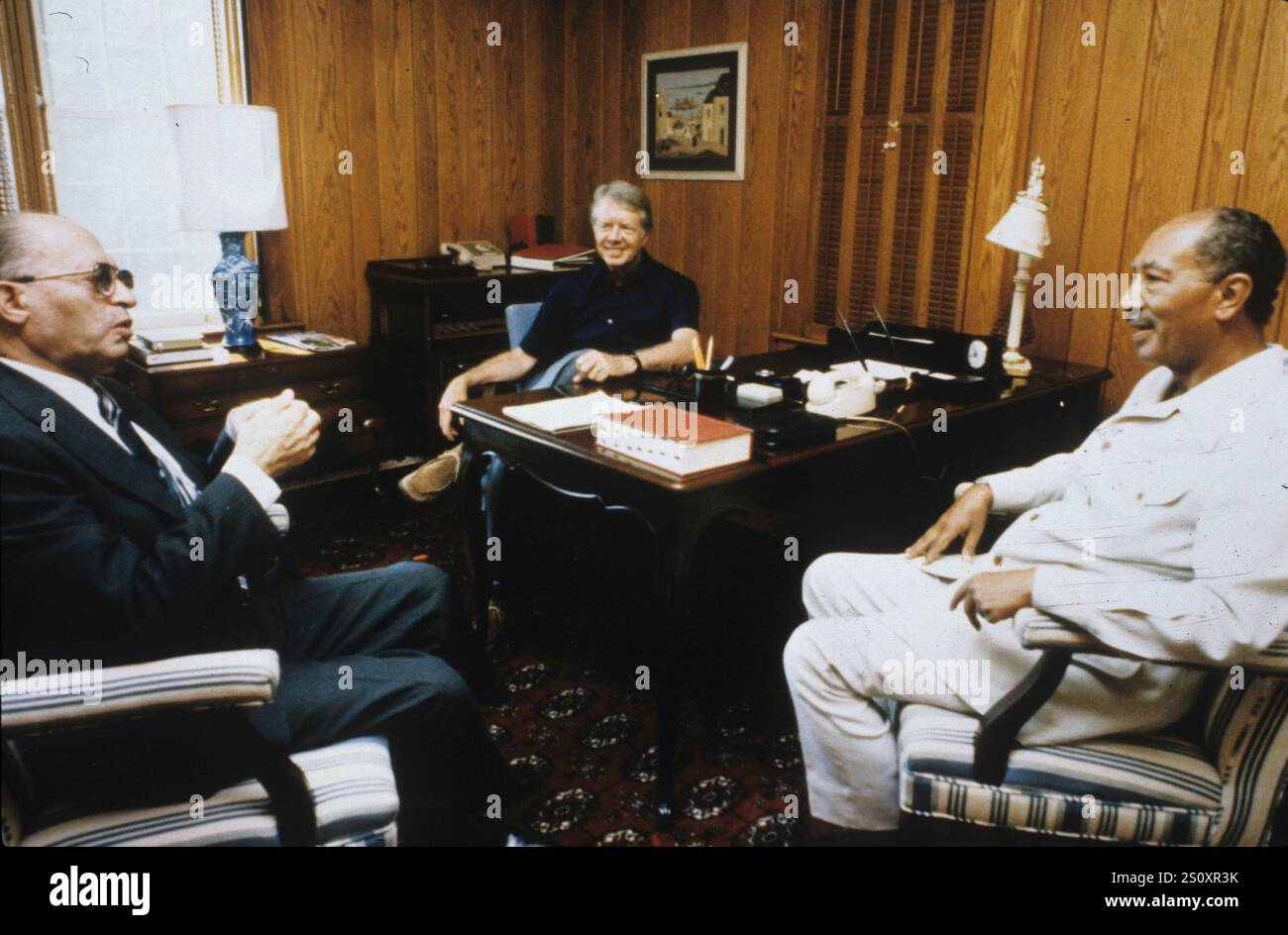 President Anwar al-Sadat of Egypt, right, listens to Premier Menachem ...