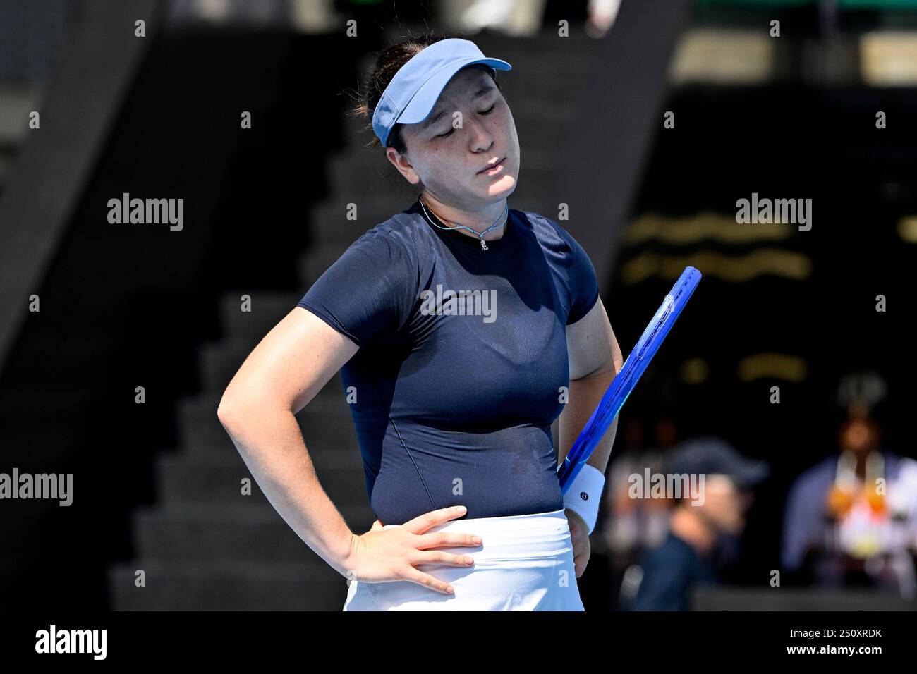Lulu Sun of New Zealand reacts after losing a point against Rebecca ...