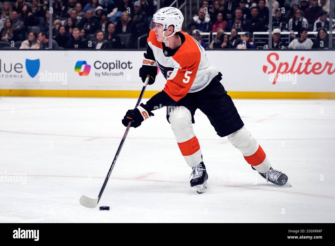 Philadelphia Flyers defenseman Egor Zamula controls the puck during the ...
