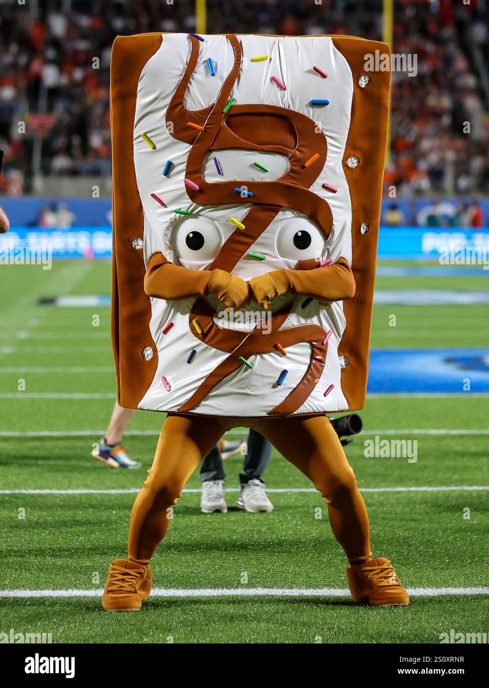 Orlando, FL, USA. 28th Dec, 2024. A Pop-Tart mascot dances during the ...