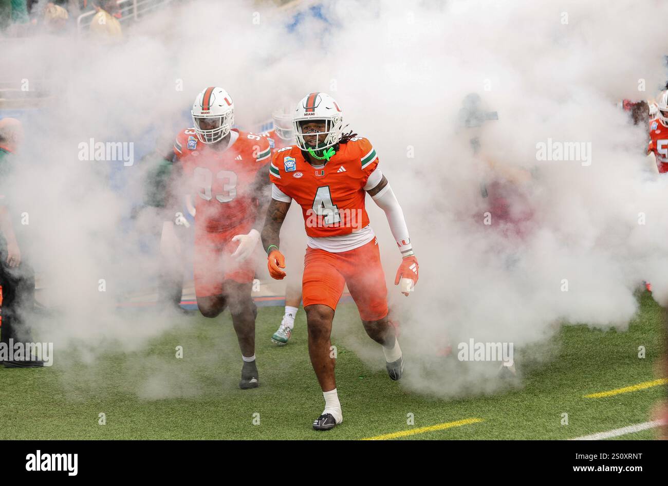 December 28, 2024: Miami's Mark Fletcher Jr. (4) leads the Hurricanes ...