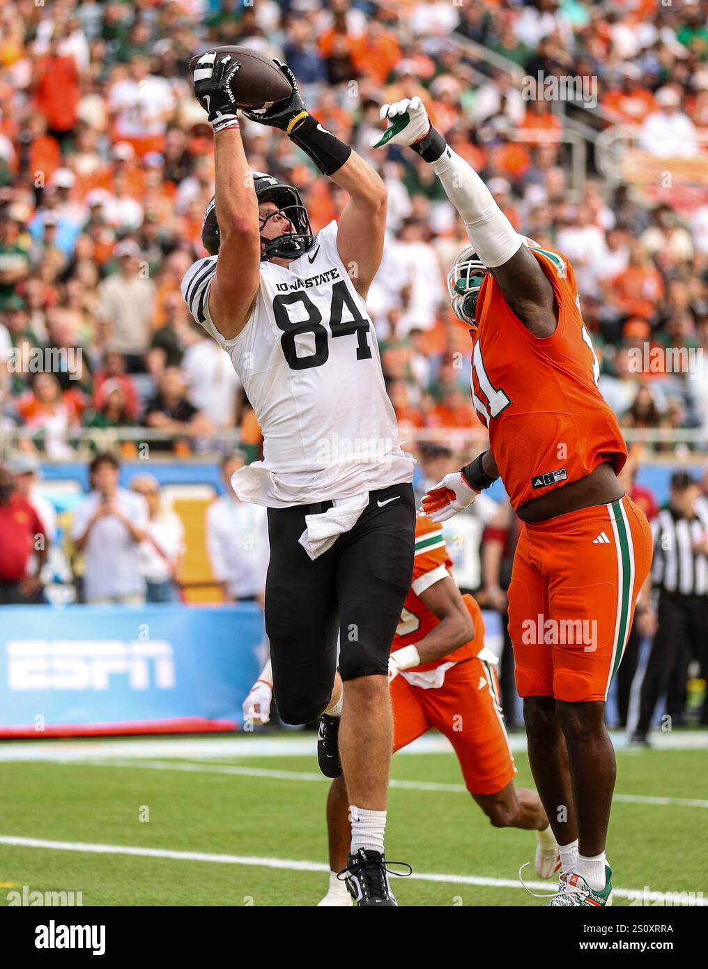 Orlando, FL, USA. 28th Dec, 2024. Iowa State's Gabe Burkle (84) catches ...