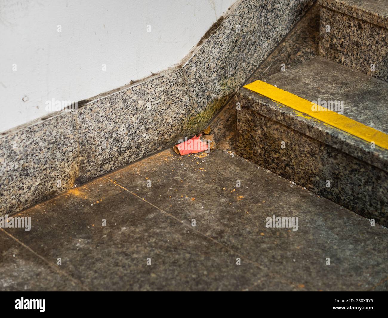 Firecracker waste lying inside a building. Dirt and rubbish after a new ...