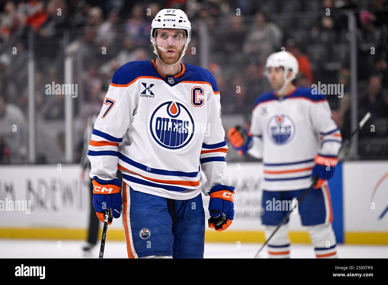 Edmonton Oilers center Connor McDavid (97) prepares for a face-off ...