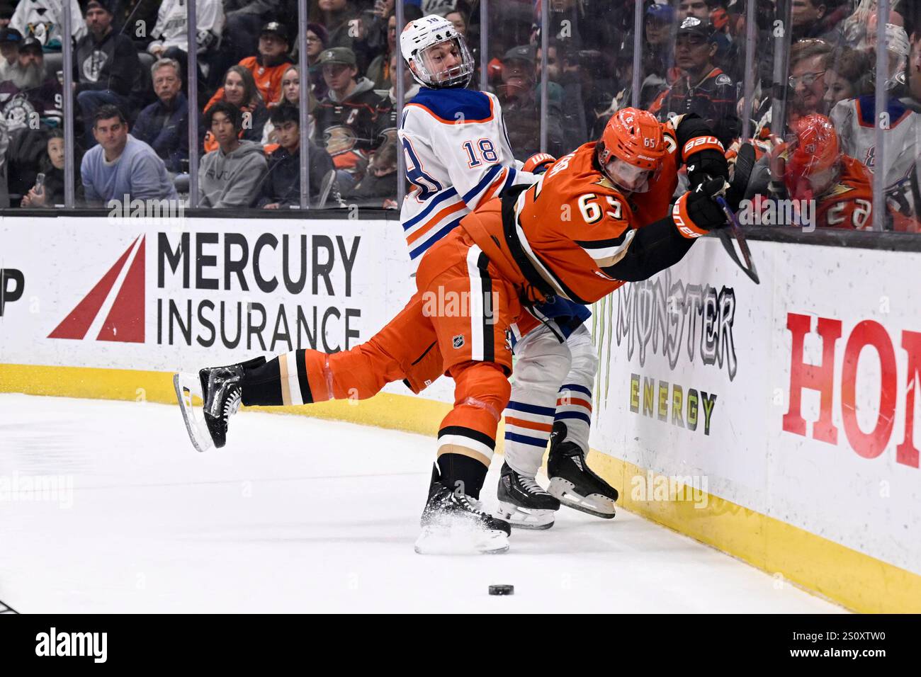 Anaheim Ducks defenseman Jacob Trouba (65) pushes the puck away from ...