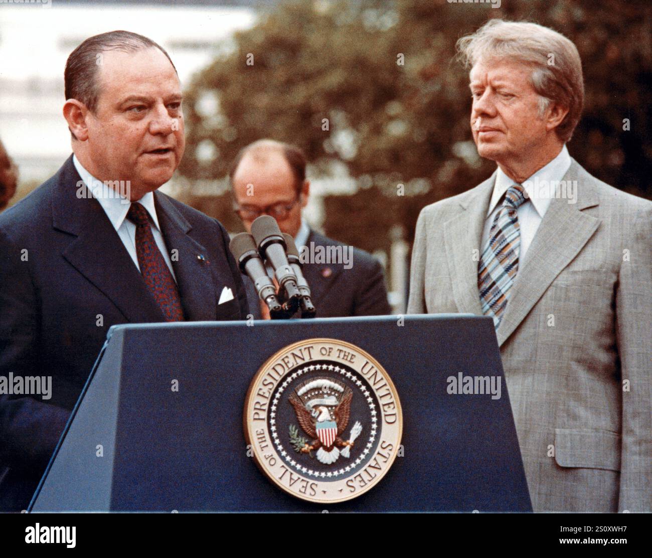 United States President Jimmy Carter, right, looks on as Prime Minister ...