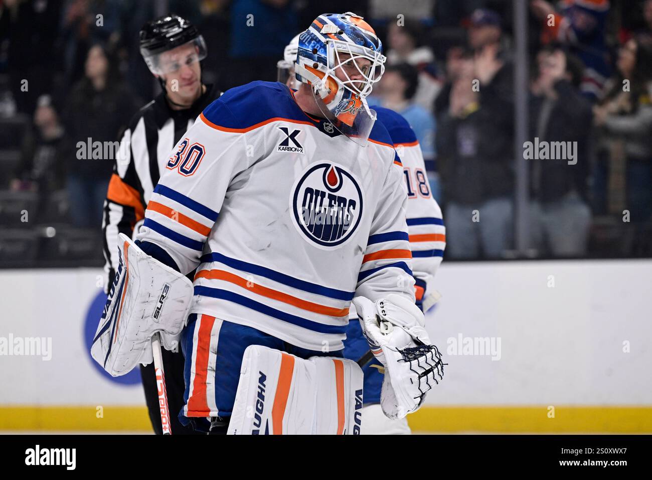 Edmonton Oilers goaltender Calvin Pickard (30) skates back to his ...