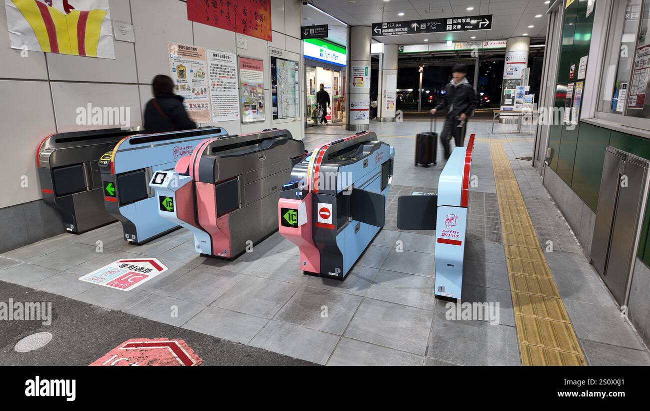 Night view of the Kagoshima Main Line platform inside Yawata Station ...