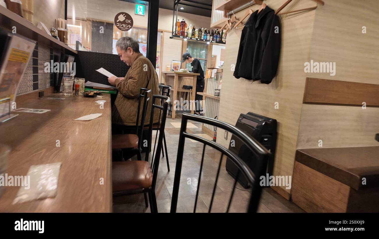 December 18, 2024 Evening scene at a set meal restaurant located inside ...