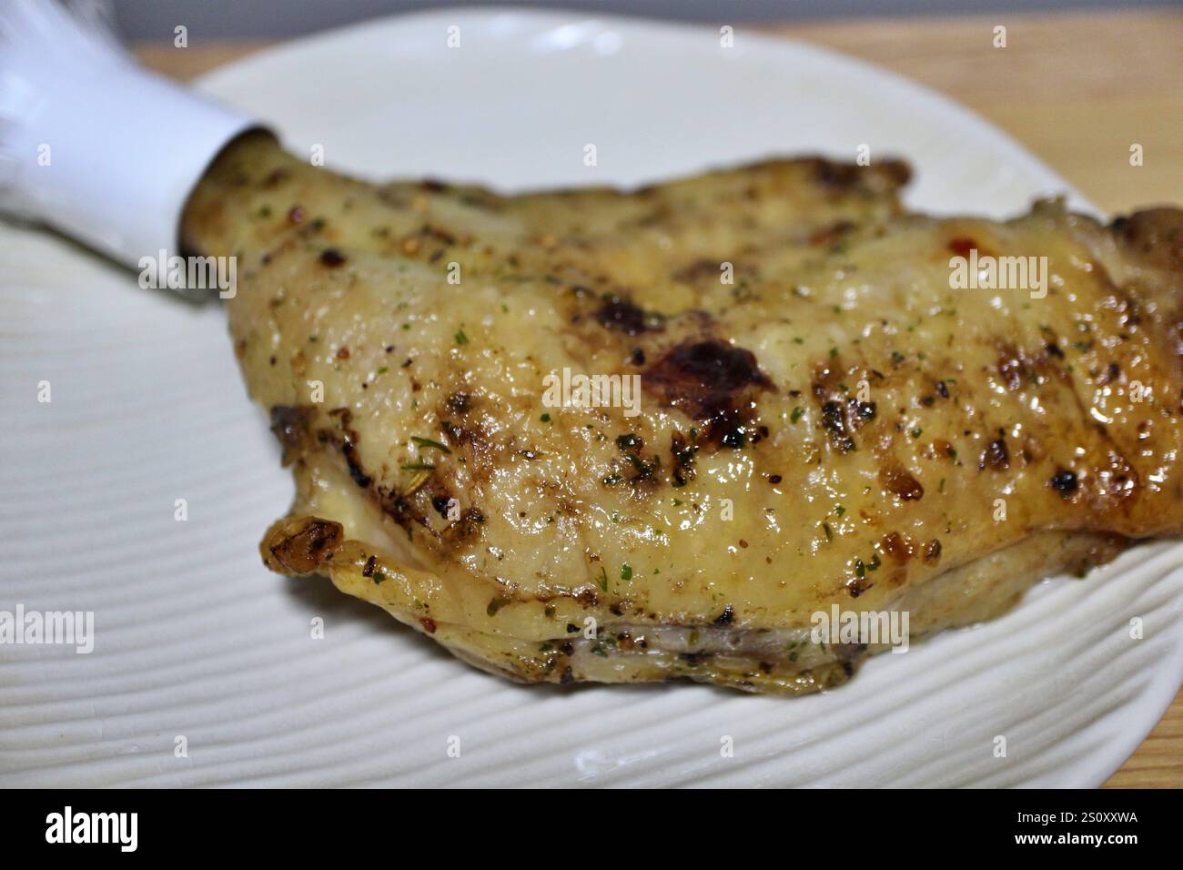 Roasted chicken leg purchased at a supermarket in Tokyo, Japan Stock ...