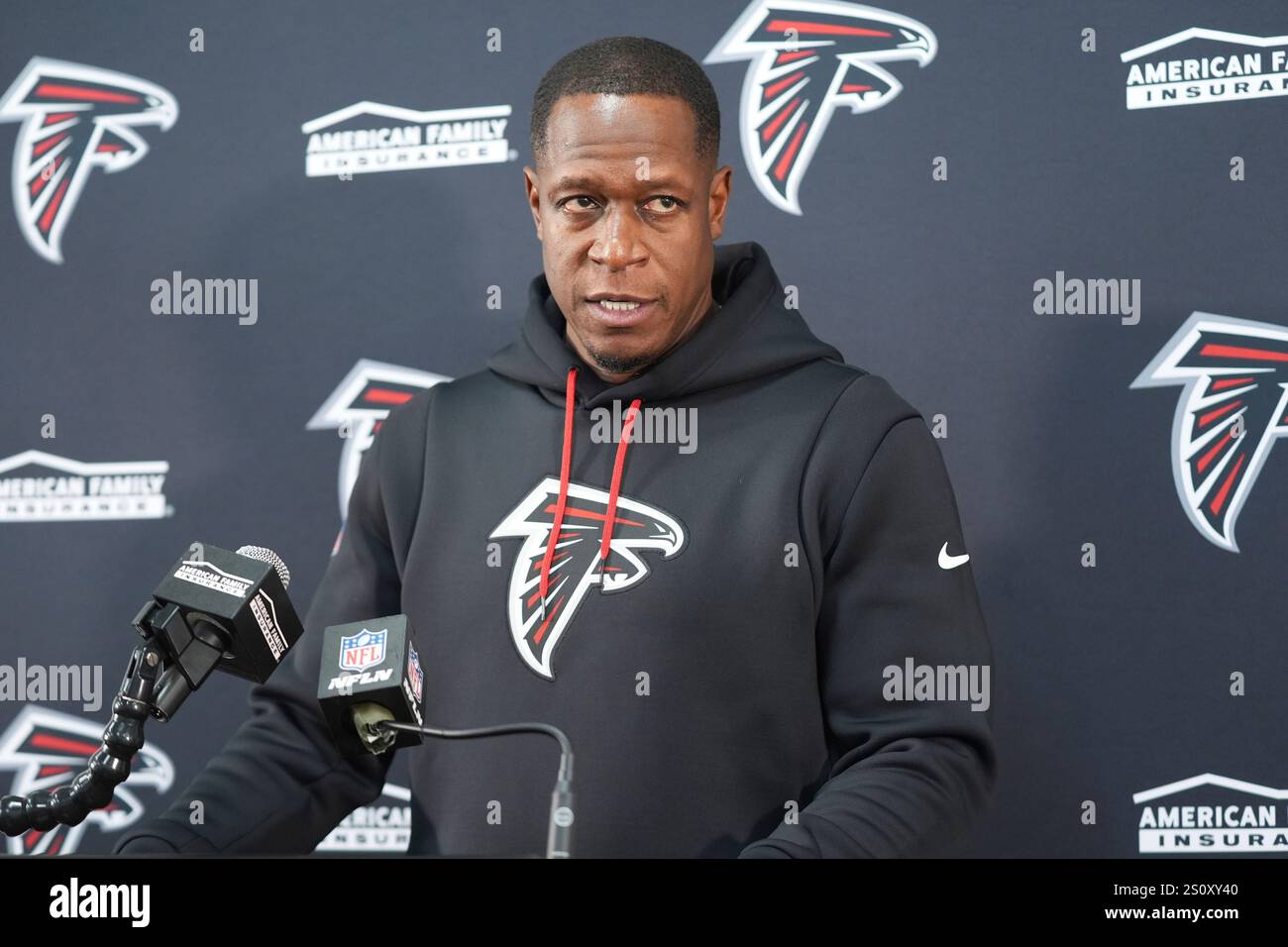 Atlanta Falcons head coach Raheem Morris talks to reporters after an ...