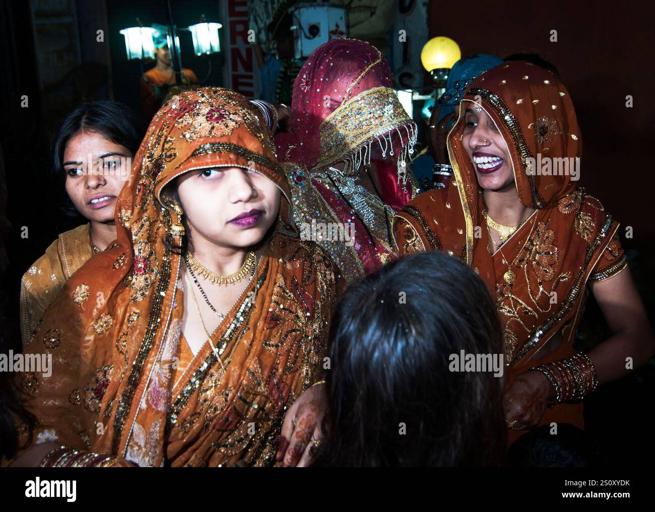 A colorful Indian wedding procession in the streets of Agra, India ...