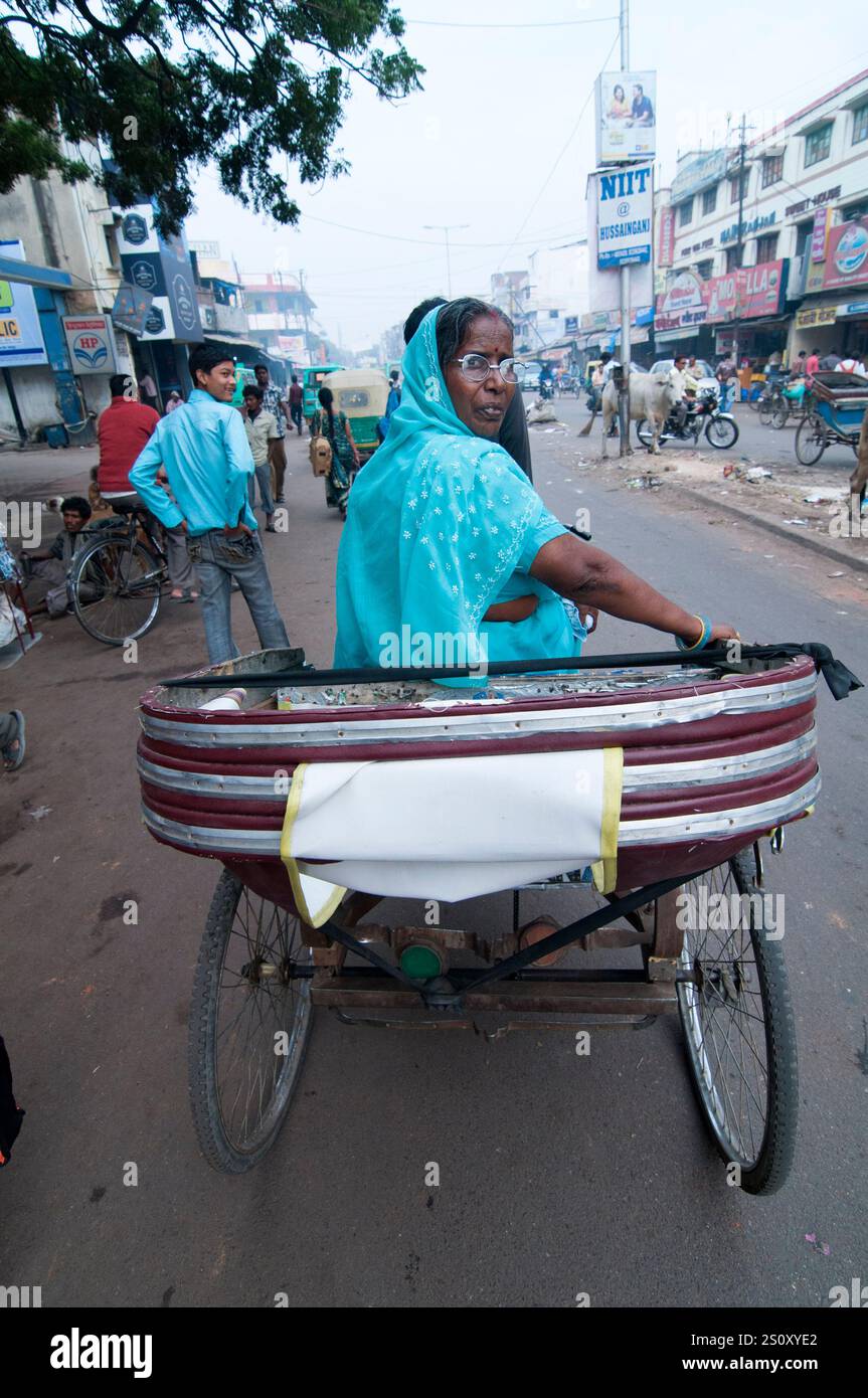 A local woman sitting on a bicycle rickshaw. Lucknow ,India Stock Photo - Alamy