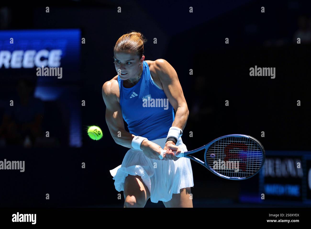 Maria Sakkari of Greece plays a shot to Elena Rybakina of Kazakhstan ...