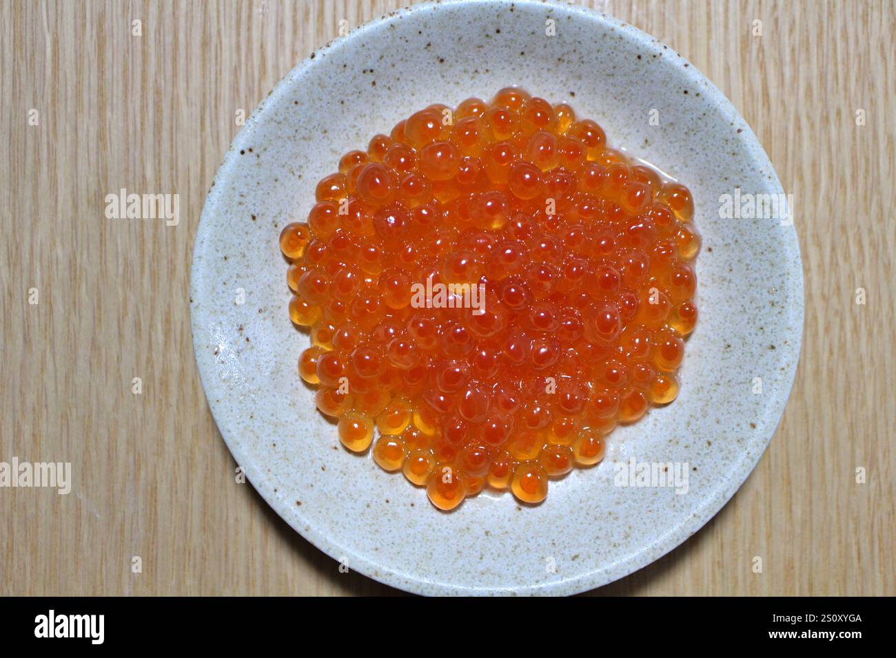 Ikura (salmon roe) marinated in soy sauce purchased at a supermarket in ...