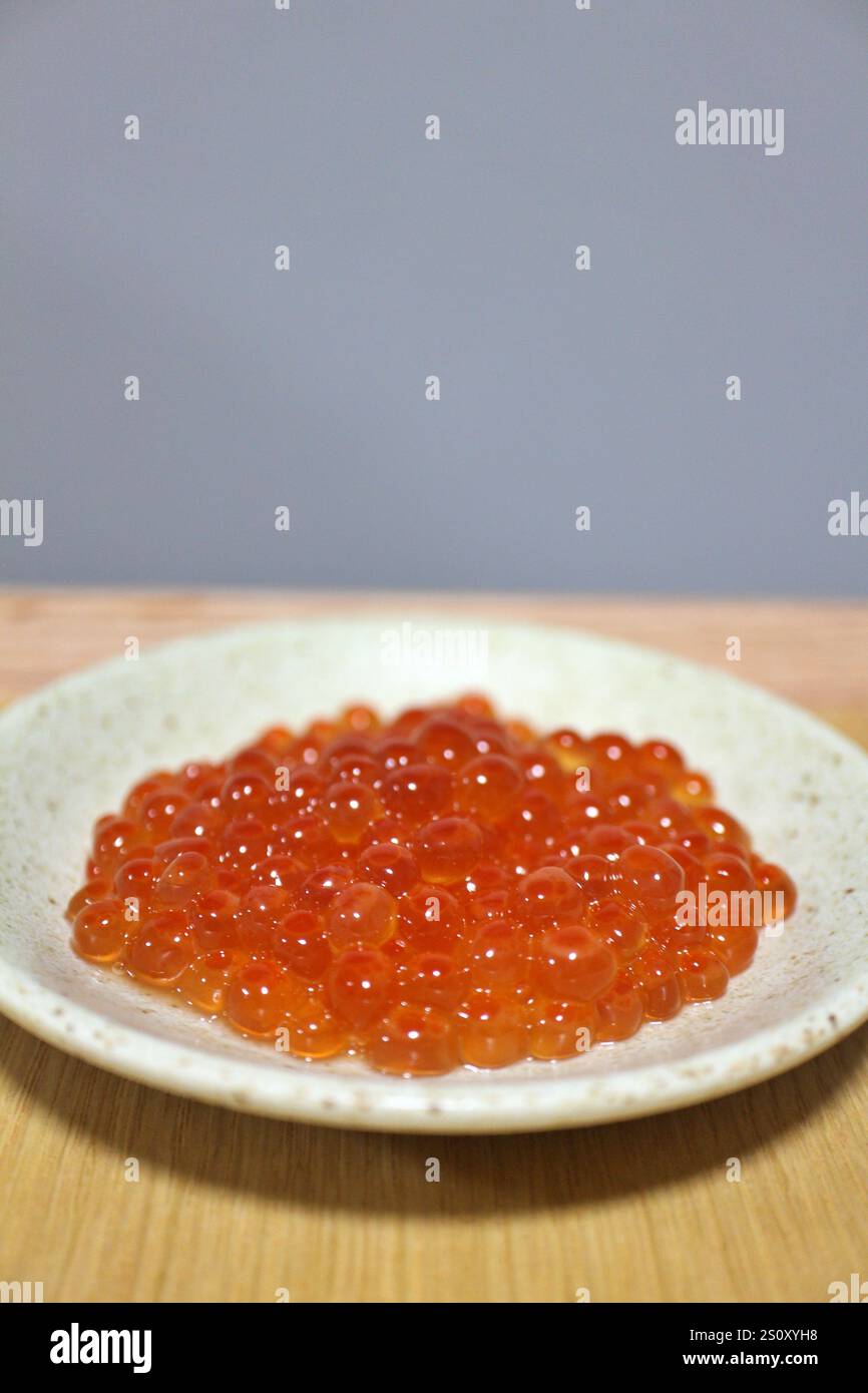 Ikura (salmon roe) marinated in soy sauce purchased at a supermarket in ...