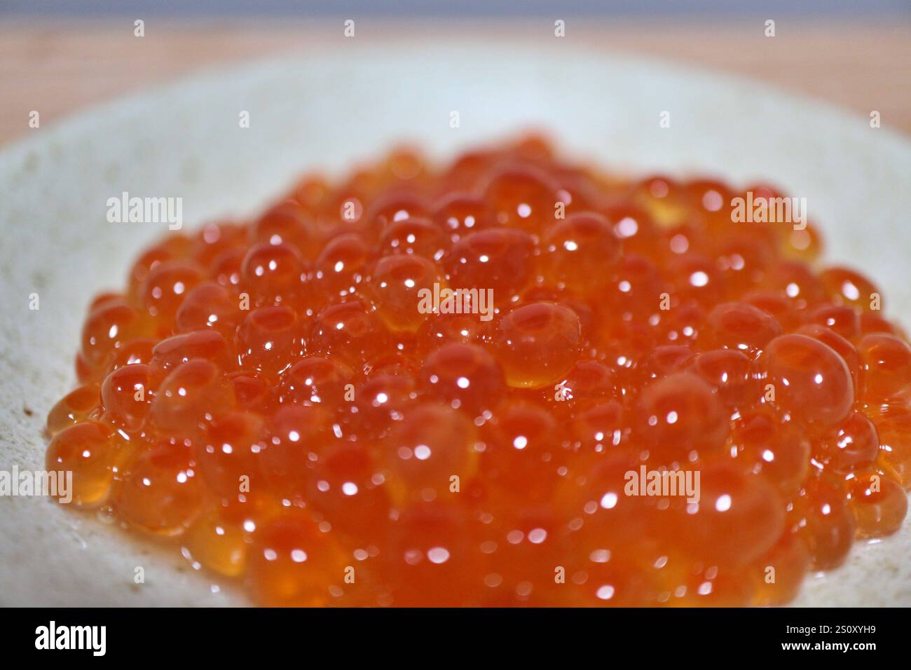 Ikura (salmon roe) marinated in soy sauce purchased at a supermarket in ...
