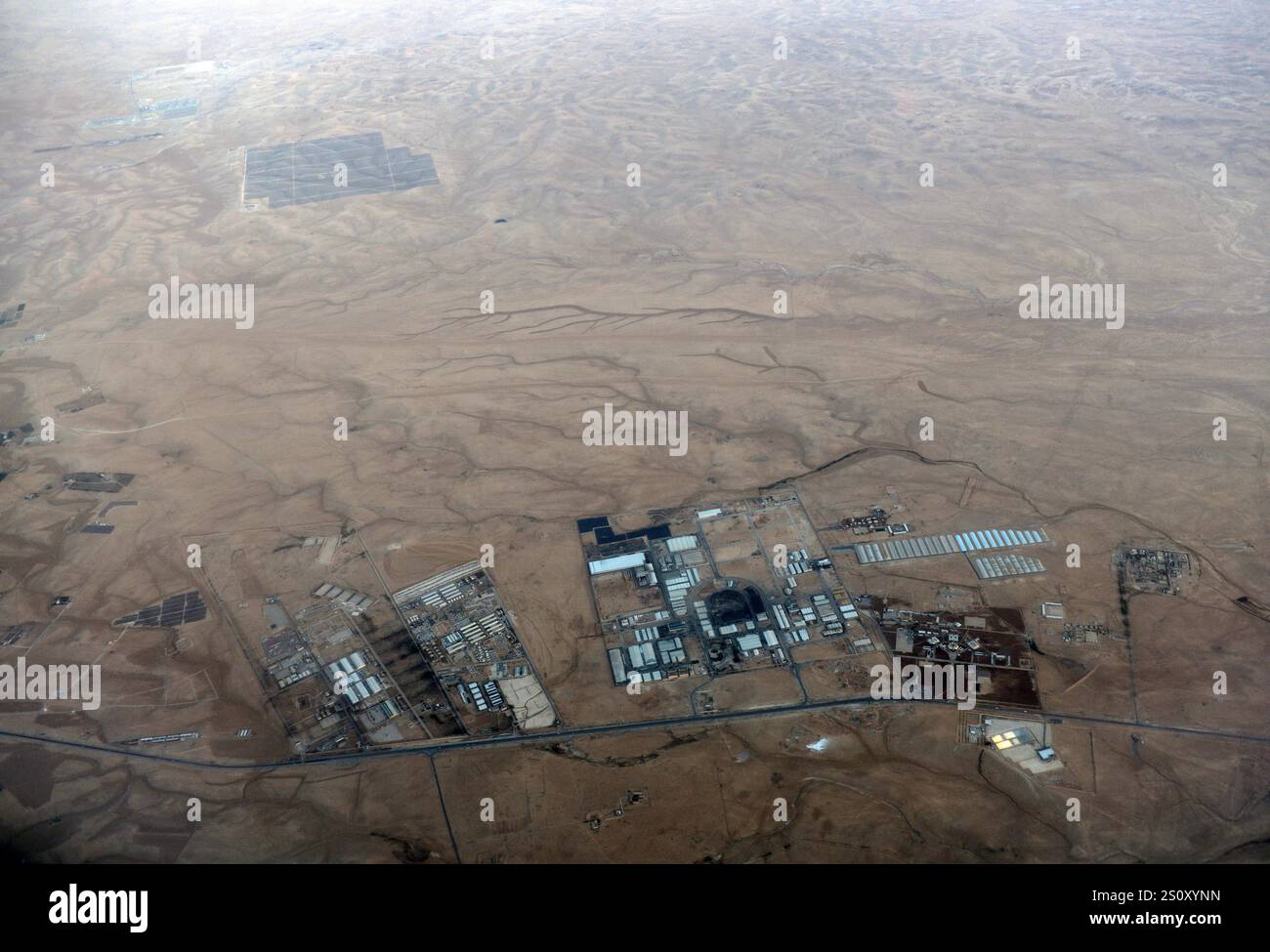 Aerial view of the AlMuwaqar Industrial city and the Baynouna 200MW ...