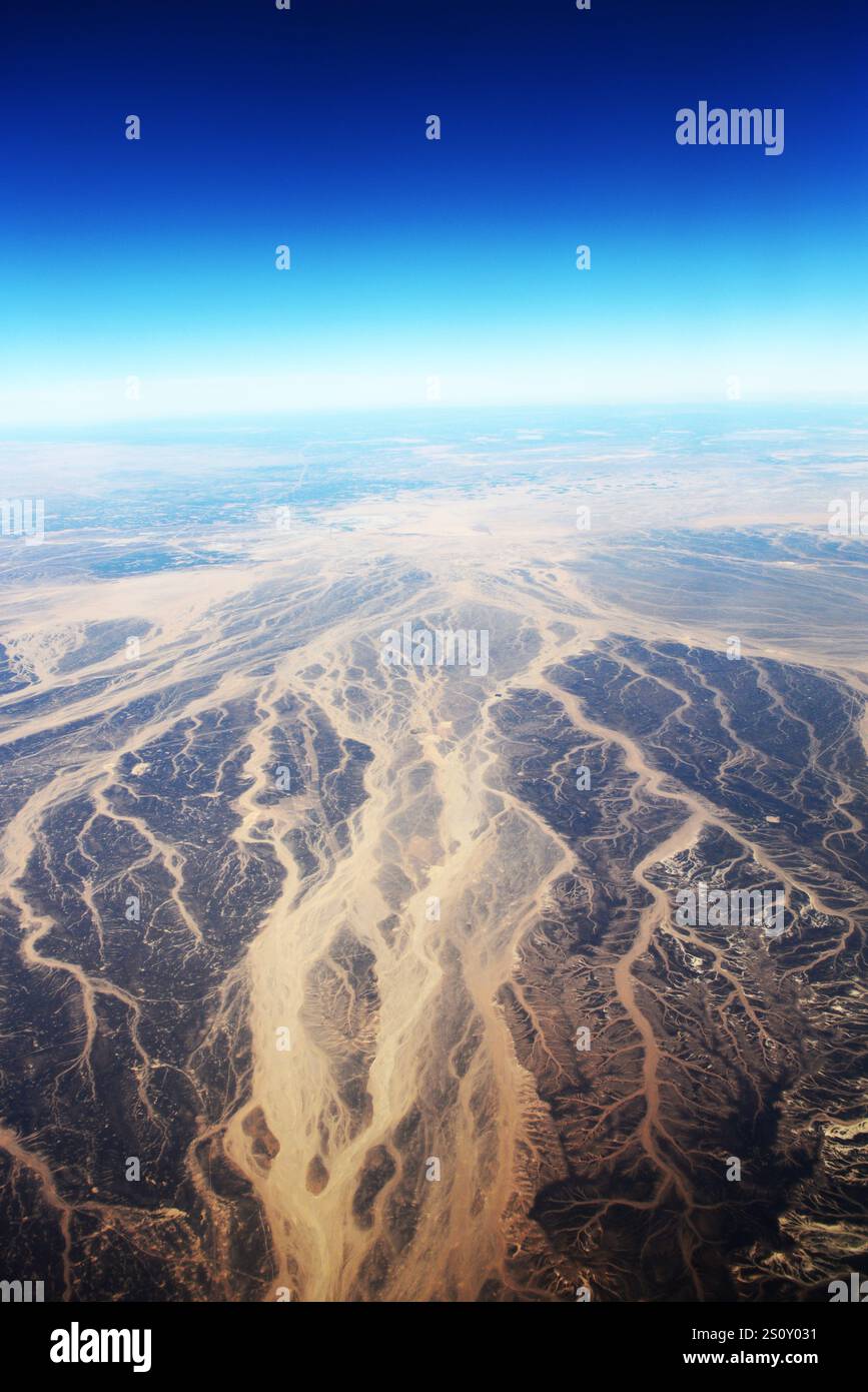 A Surreal aerial view of dried riverbeds in the desert in Jordan near ...