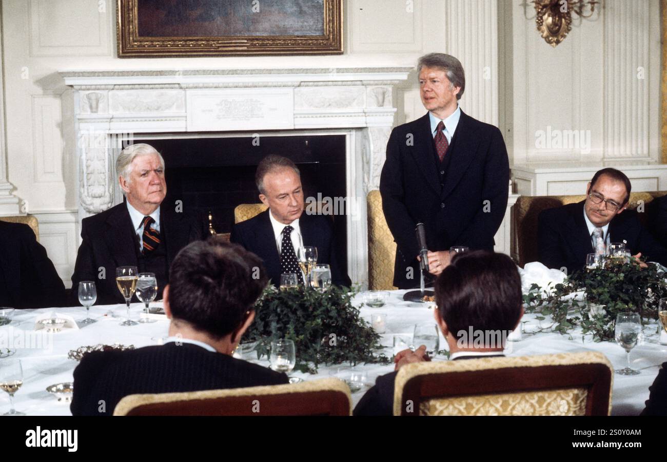 United States President Jimmy Carter, left center, offers remarks at a ...