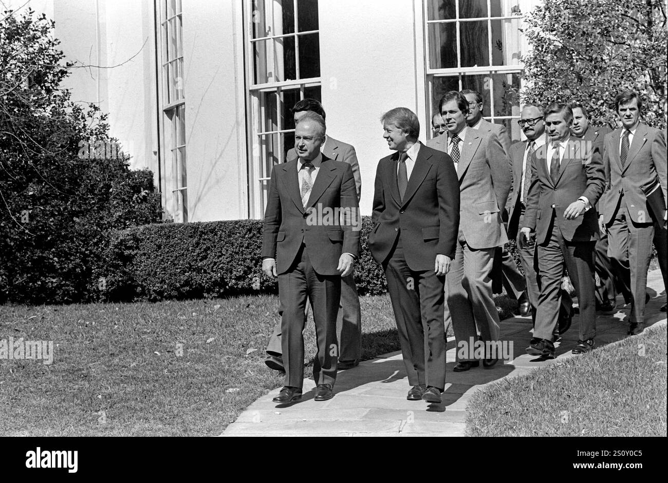 United States President Jimmy Carter walks Prime Minister Yitzhak Rabin ...