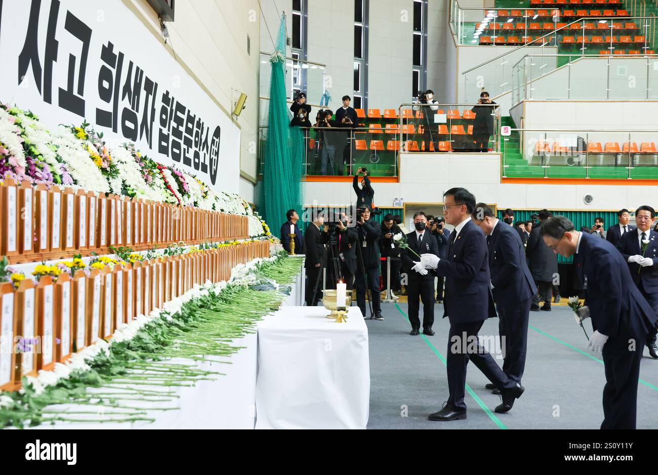 30th Dec, 2024. Memorial altar Acting President Choi Sang-mok lays flowers at a memorial altar ...