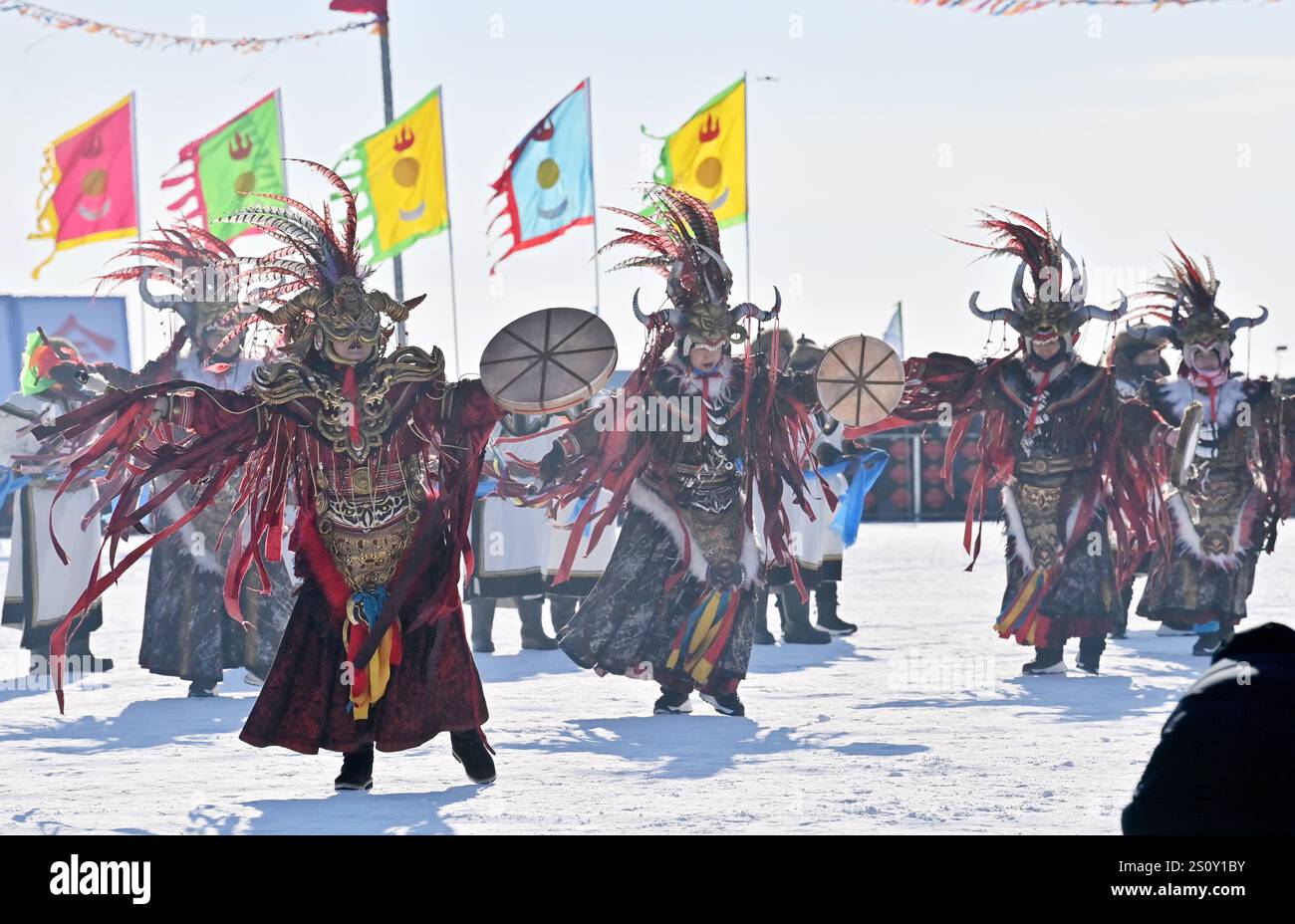 Songyuan,China.28th December 2024. Actors perform on the frozen Chagan ...