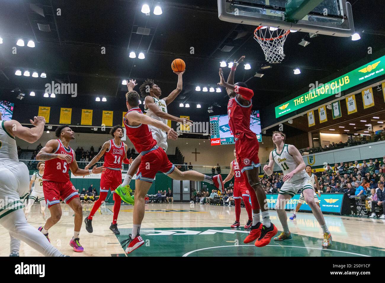 SAN FRANCISCO, CA - DECEMBER 28: USF Dons G Tyrone Riley IV (5) goes up ...