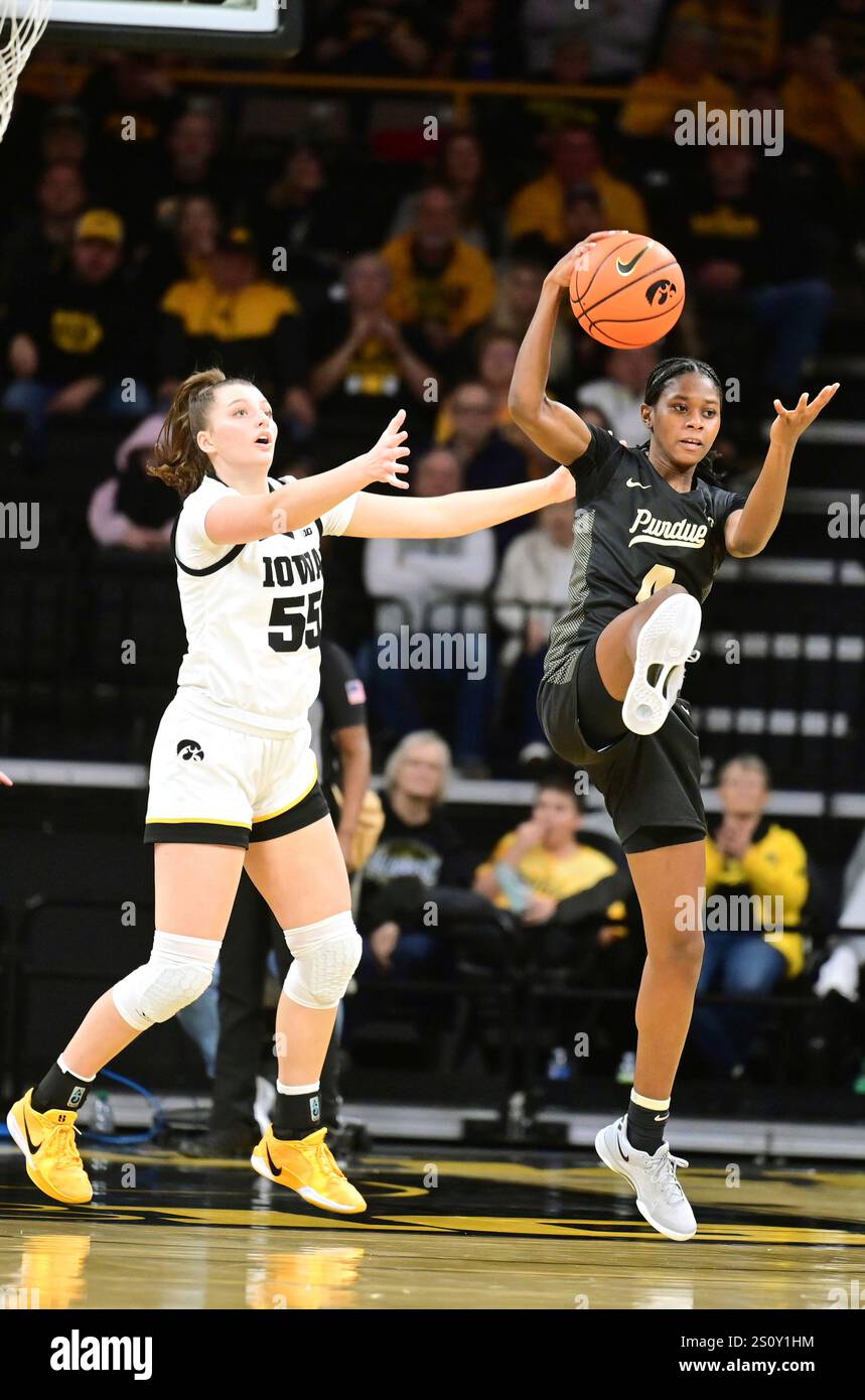 IOWA CITY, IA - DECEMBER 29: Purdue guard Destini Lombard (4) rebounds ...