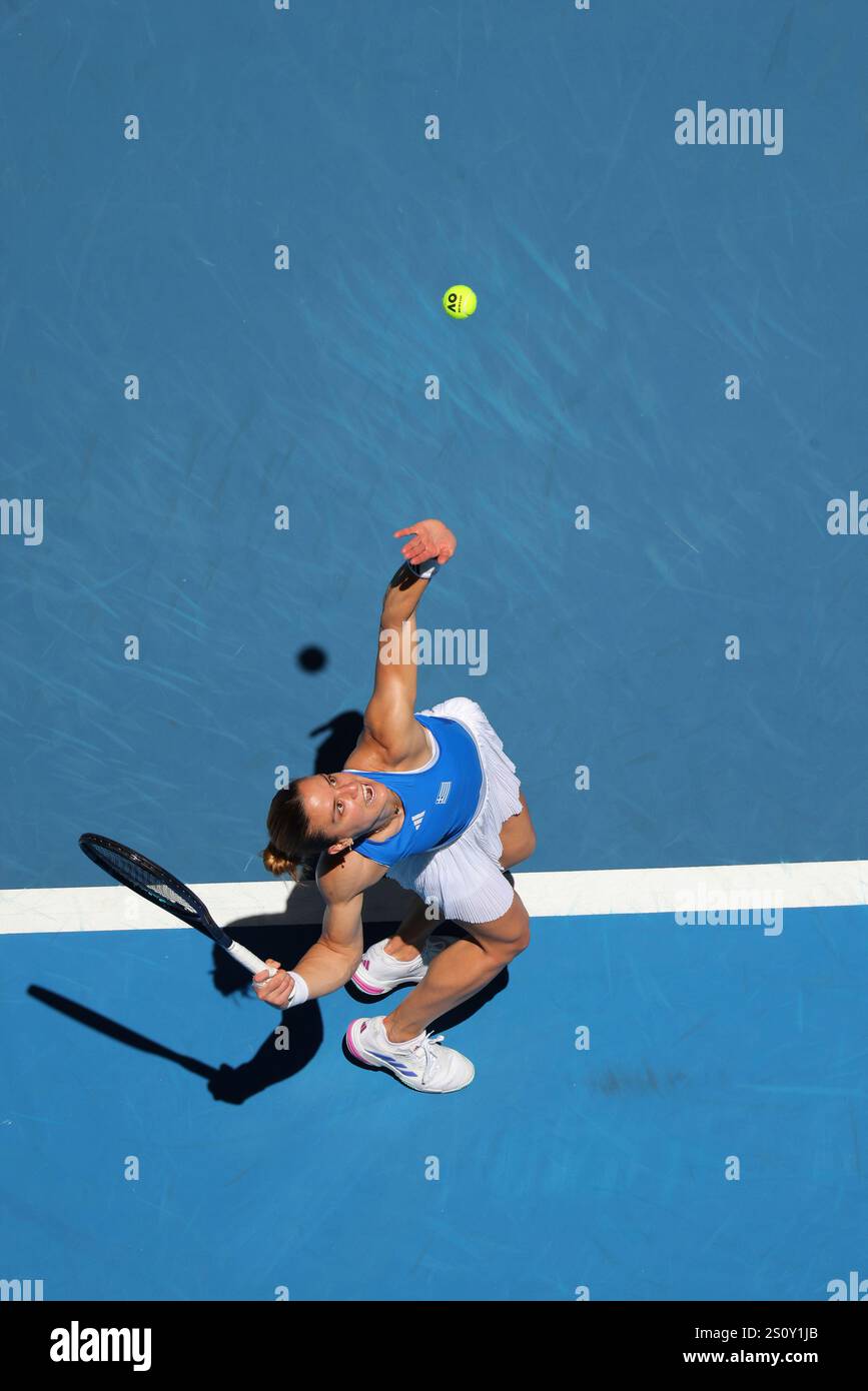 Maria Sakkari of Greece serves to Elena Rybakina of Kazakhstan during ...