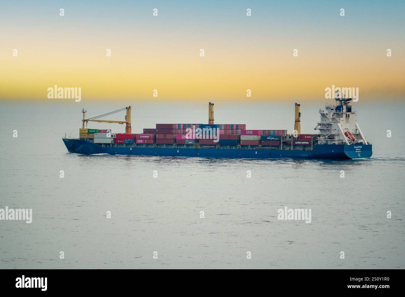 Dubai, UAE - 14 November 2024: Container ship in calm sea carrying ...