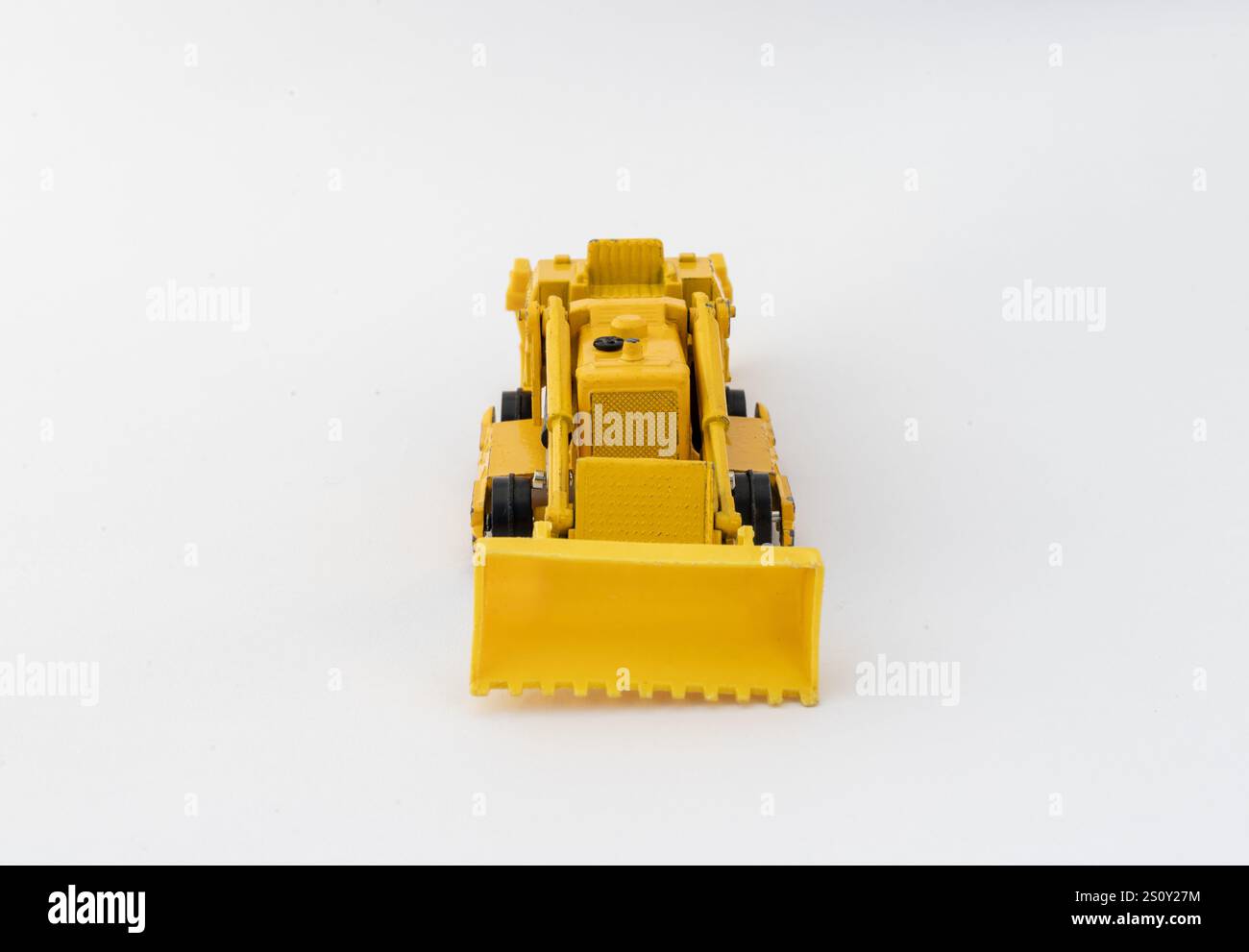 Toy excavator earth mover on white isolated background Stock Photo - Alamy