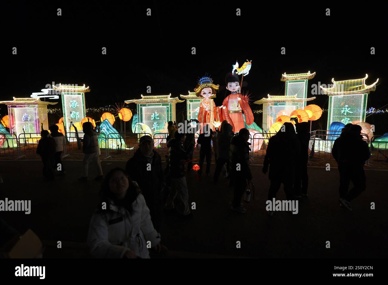 Beijing,China.28th December 2024. Multicolored lantern installations are illuminated during the ...