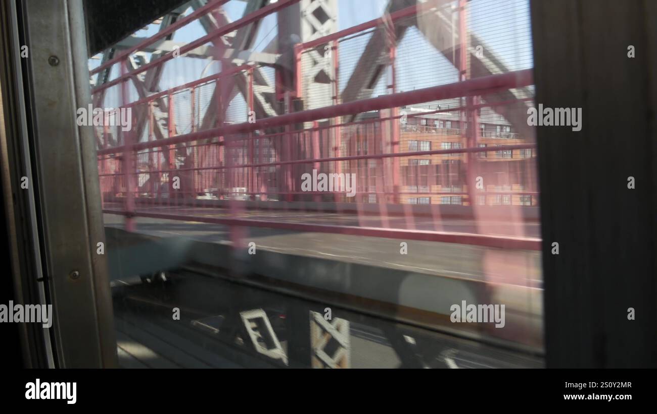 New York City subway train, Williamsburg bridge. Shaking camera thru dirty window. Manhattan ...