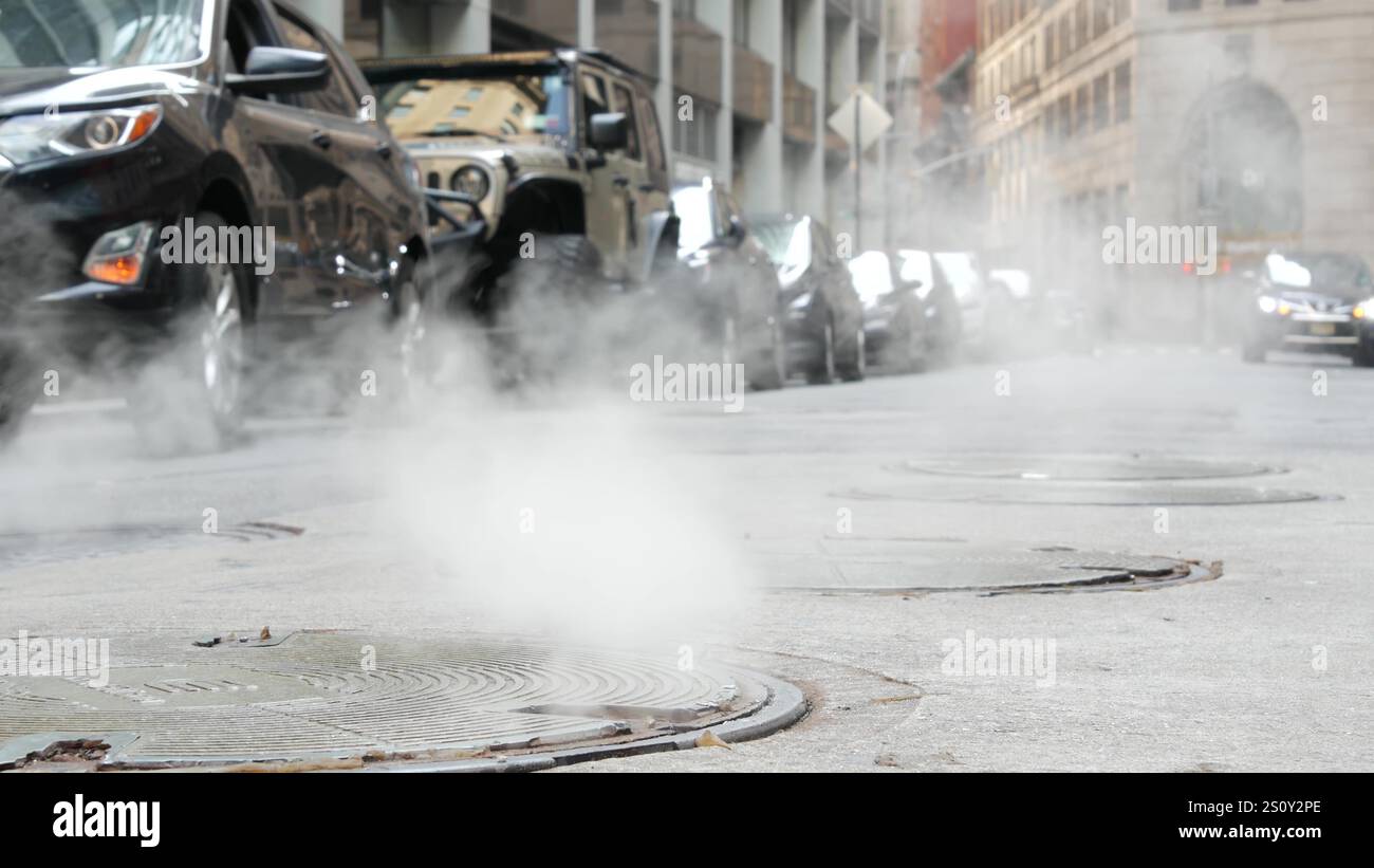 Hot smoke from manhole, Con Edison's Steam system in New York City ...