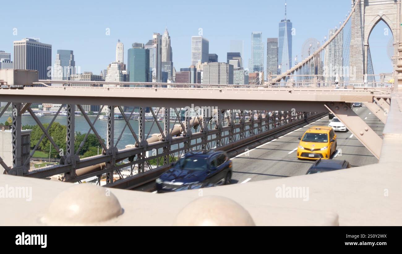 Cars on Brooklyn Bridge. New York City Manhattan downtown skyline ...