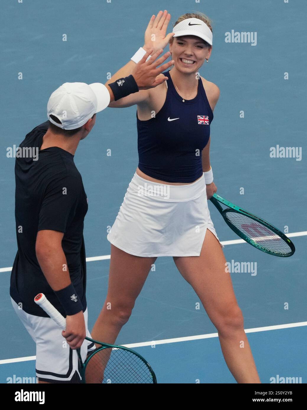 Britain's Charles Broom and Katie Boulter celebrate after defeating ...