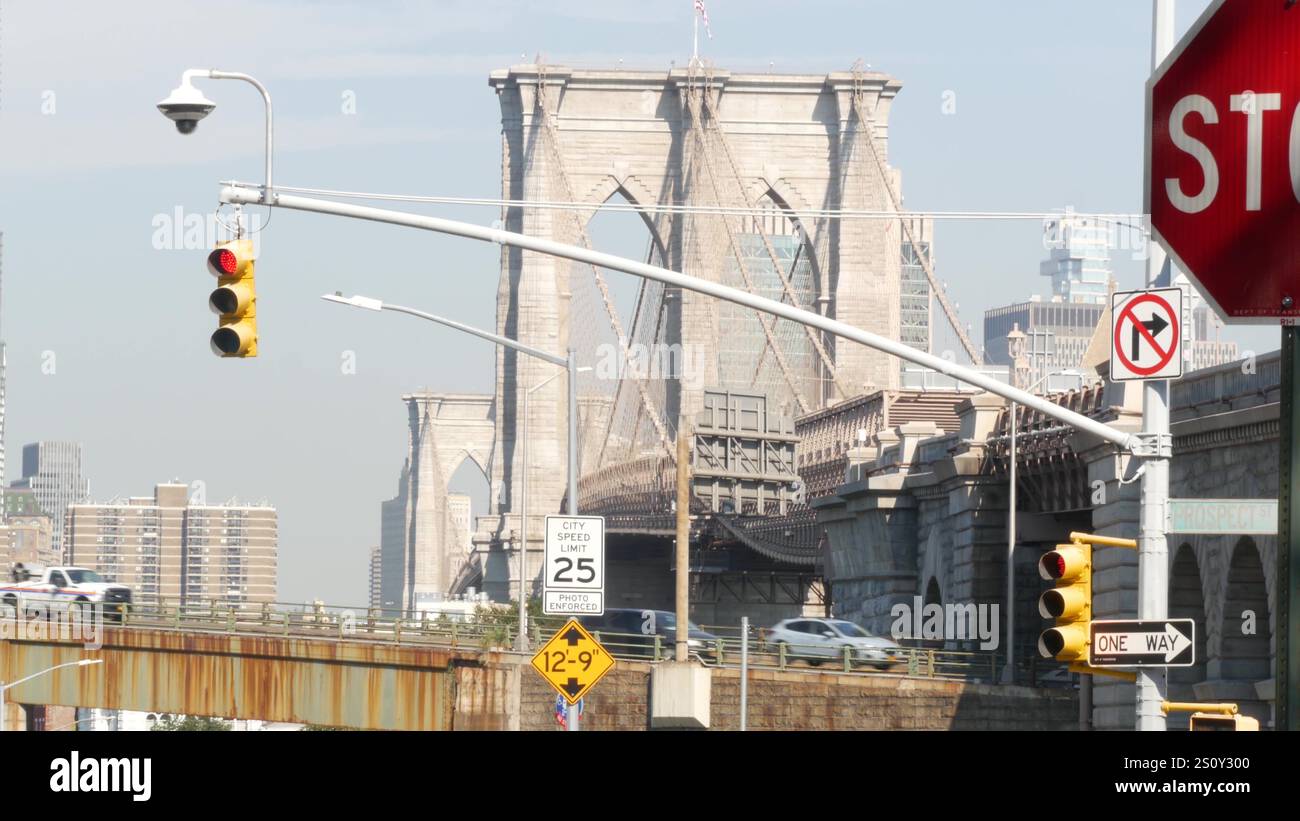 Brooklyn Bridge to Manhattan downtown. New York City iconic symbol, USA travel destination ...
