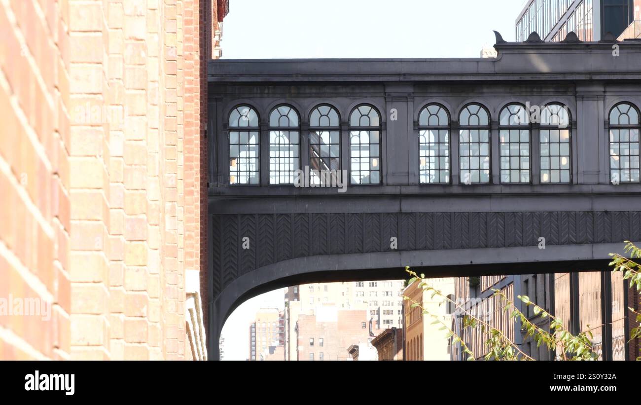 New York City street, Chelsea Market skybridge. Retro industrial ...