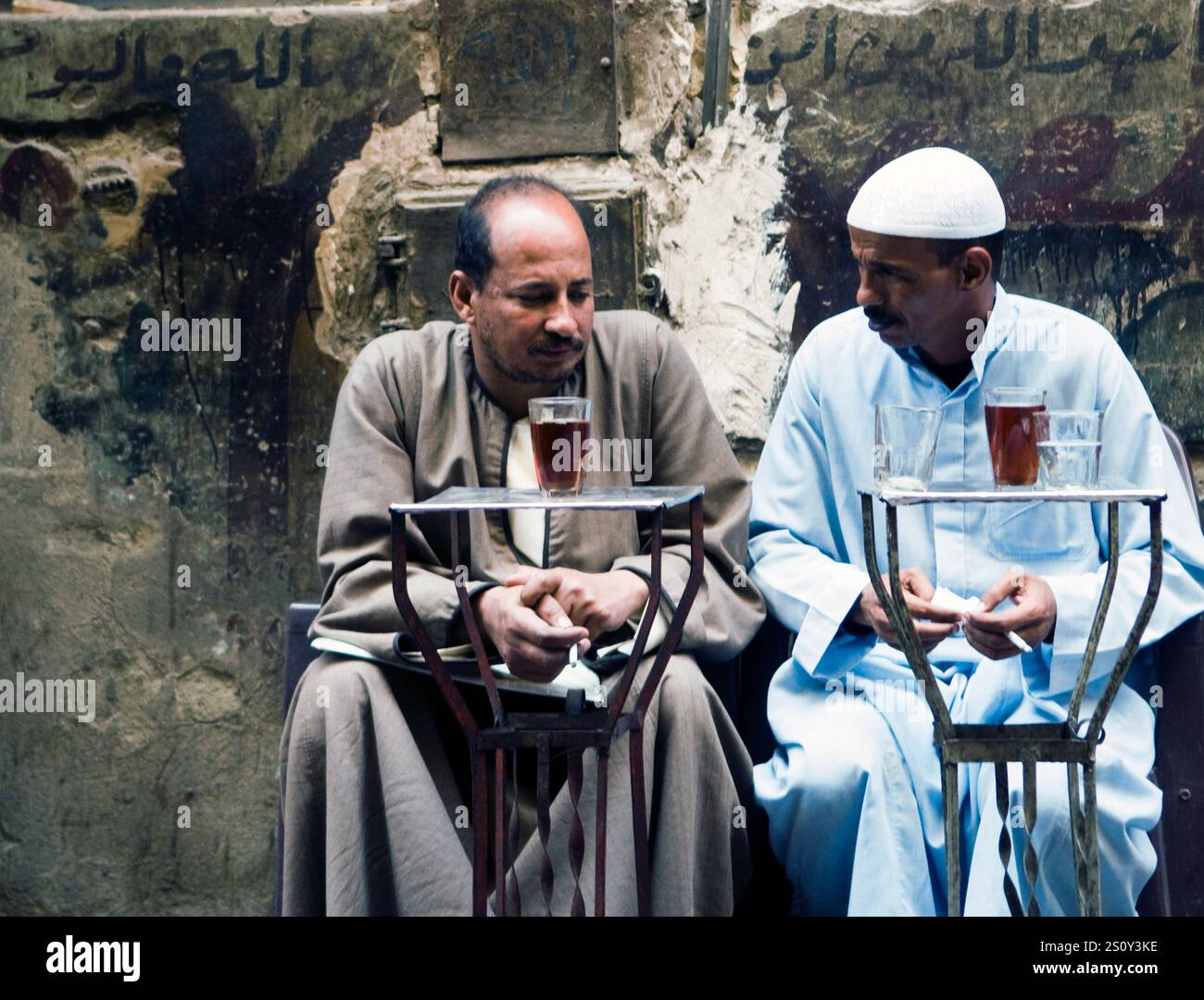 Egyptian men socializing in a small tea house in Islamic Cairo, Cairo, Egypt Stock Photo - Alamy