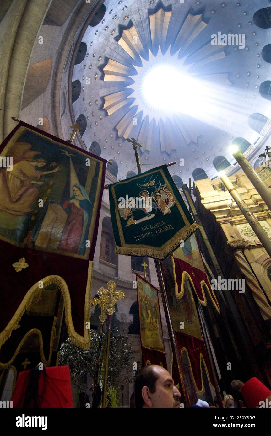 Coptic priests in the Palm Sunday procession around the Aedicule in the Church of the Holy ...