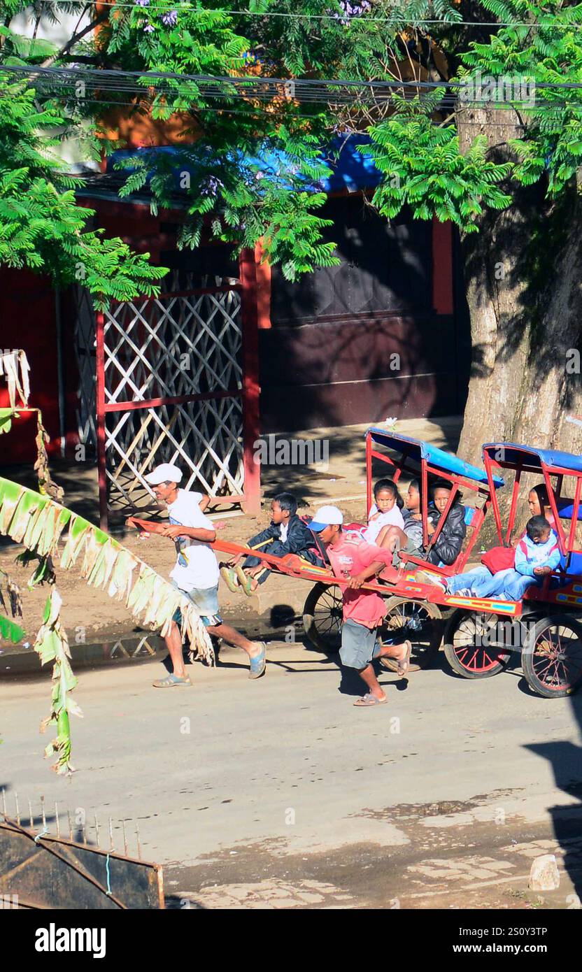 A pousse pousse in the streets of Antsirabe, Madagascar Stock Photo - Alamy