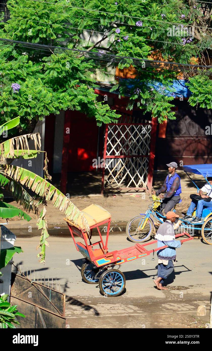 A pousse pousse in the streets of Antsirabe, Madagascar Stock Photo - Alamy