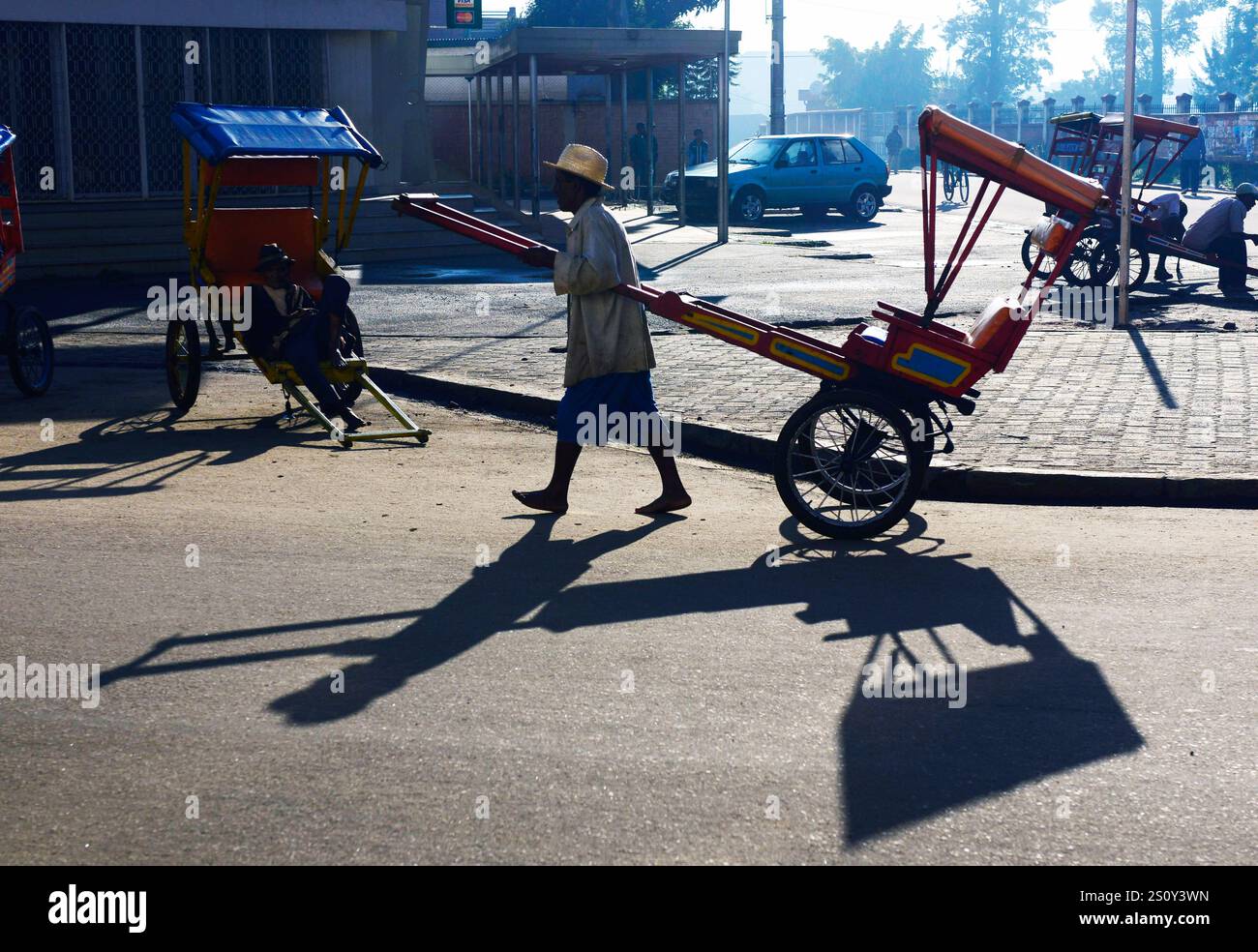 A pousse pousse in the streets of Antsirabe, Madagascar Stock Photo - Alamy